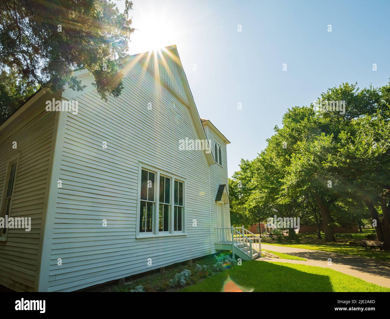 Sunny view of historical Renner School building in Old City Park at ...
