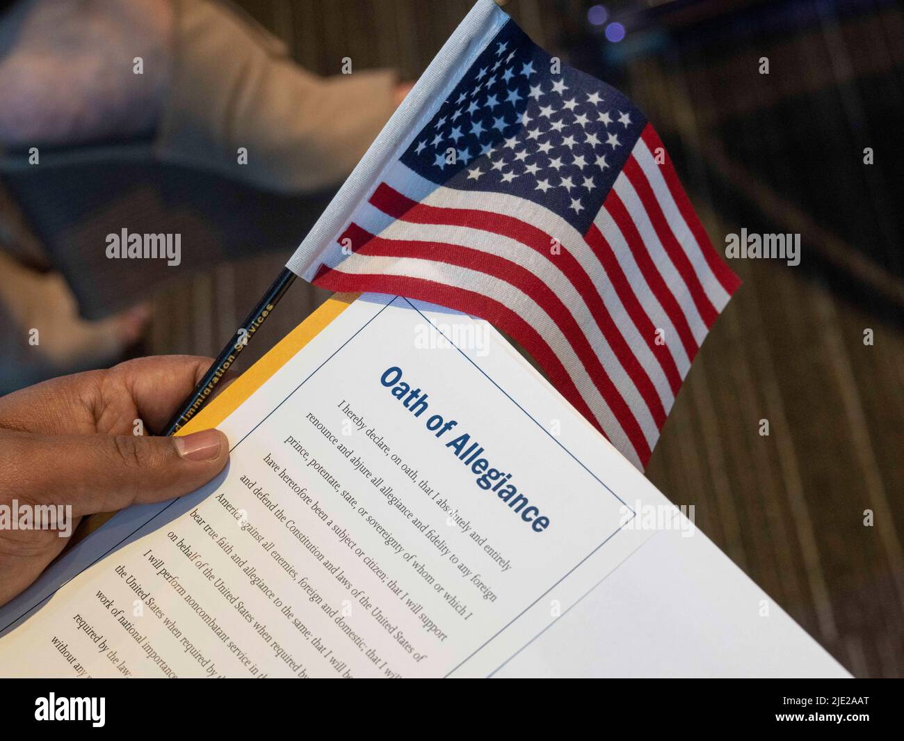 Austin Texas USA, June 24, 2022: A soon-to-be new U.S. citizen holds ...