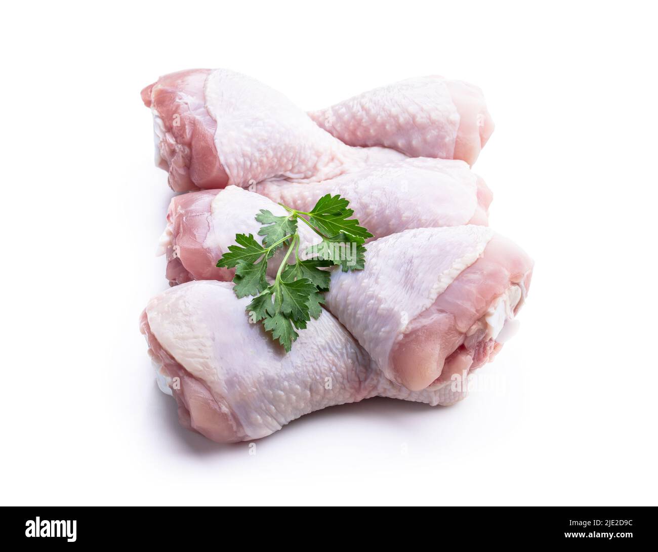 Raw chicken legs isolated on white Stock Photo - Alamy