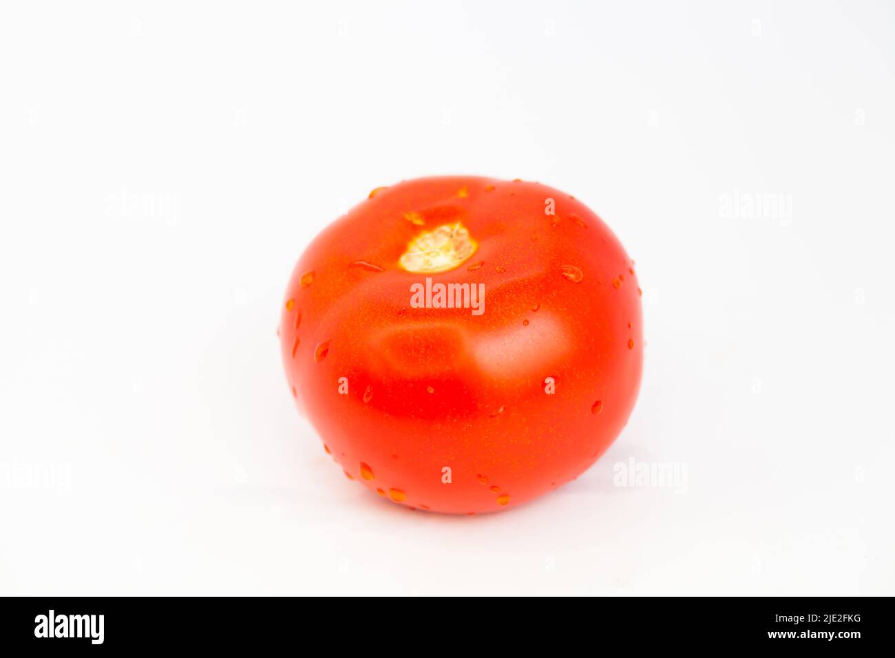 Big fresh red tomato for Venetarians and lovers of healthy natural food ...