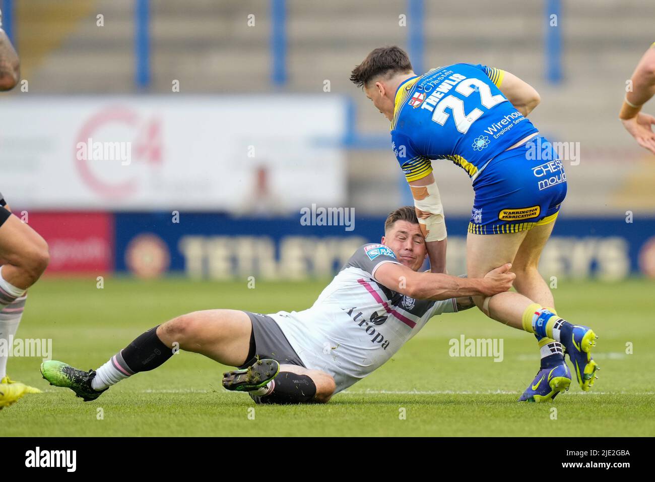 Warrington, UK. 24th June, 2022. Jamie Shaul #29 of Hull FC tackles ...