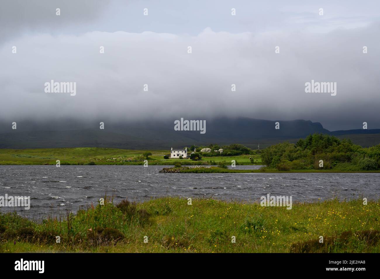 A house across loch mealt Stock Photo - Alamy