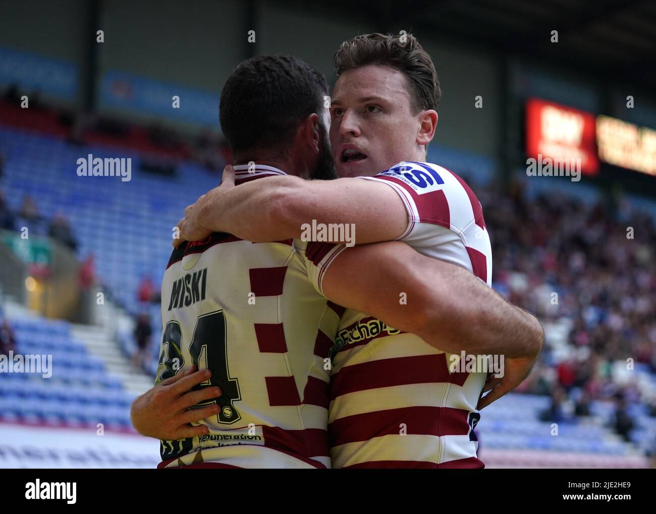 Wigan WarriorsÕ Abbas Miski (left) celebrates scoring his sides third ...