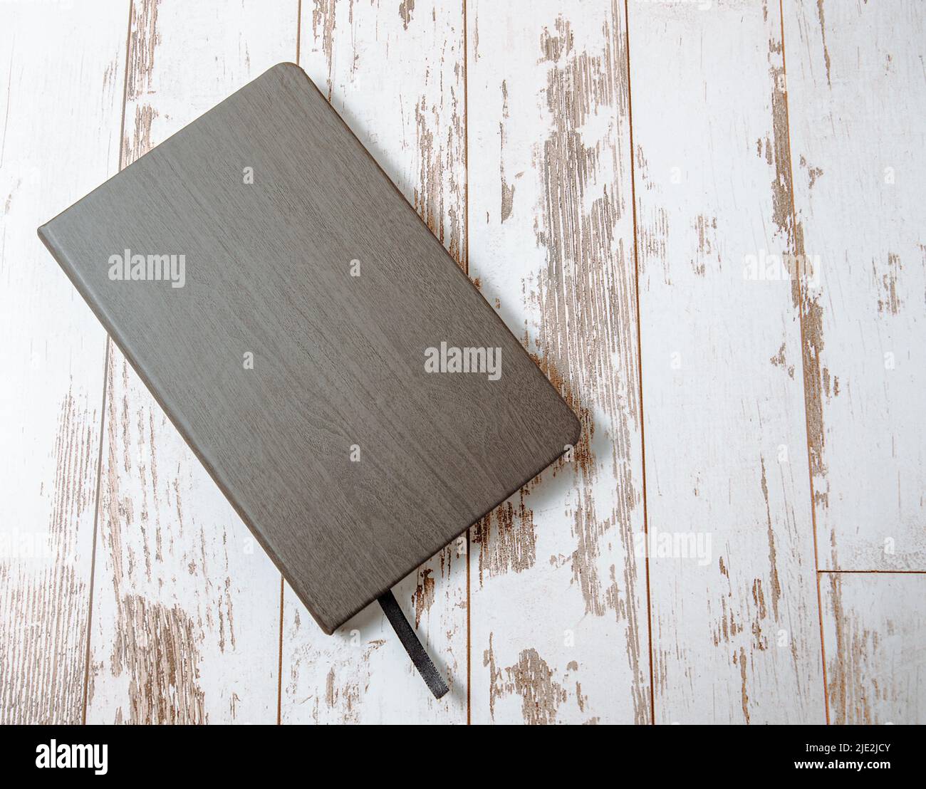 Notebook on wooden table, vintage picture tone, ready to add text or ...