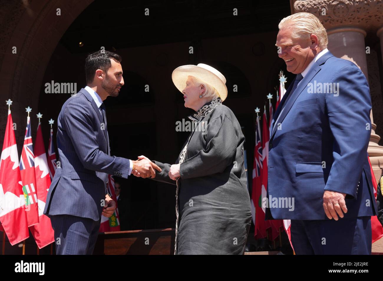 Stephen Lecce, Minister of Education shakes hands with Lieutenant ...