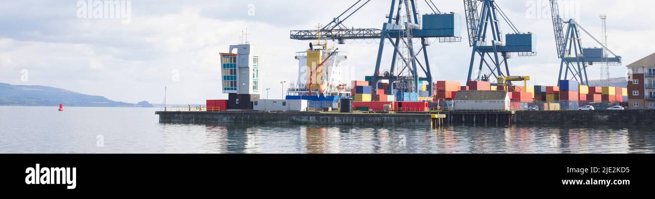 Cranes at logistics port terminal for offloading containers Stock Photo ...