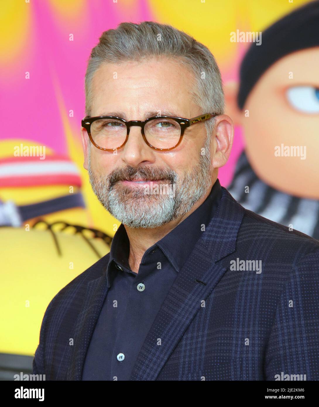 Steve Carell arrives at Illumination s Minions placed their hands and ...