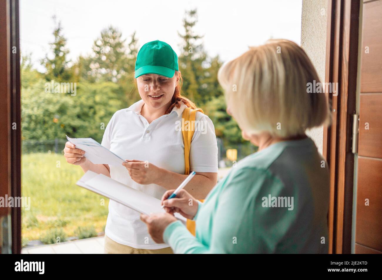 Cargo carrier holds a cardboard box with the package inside and the ...