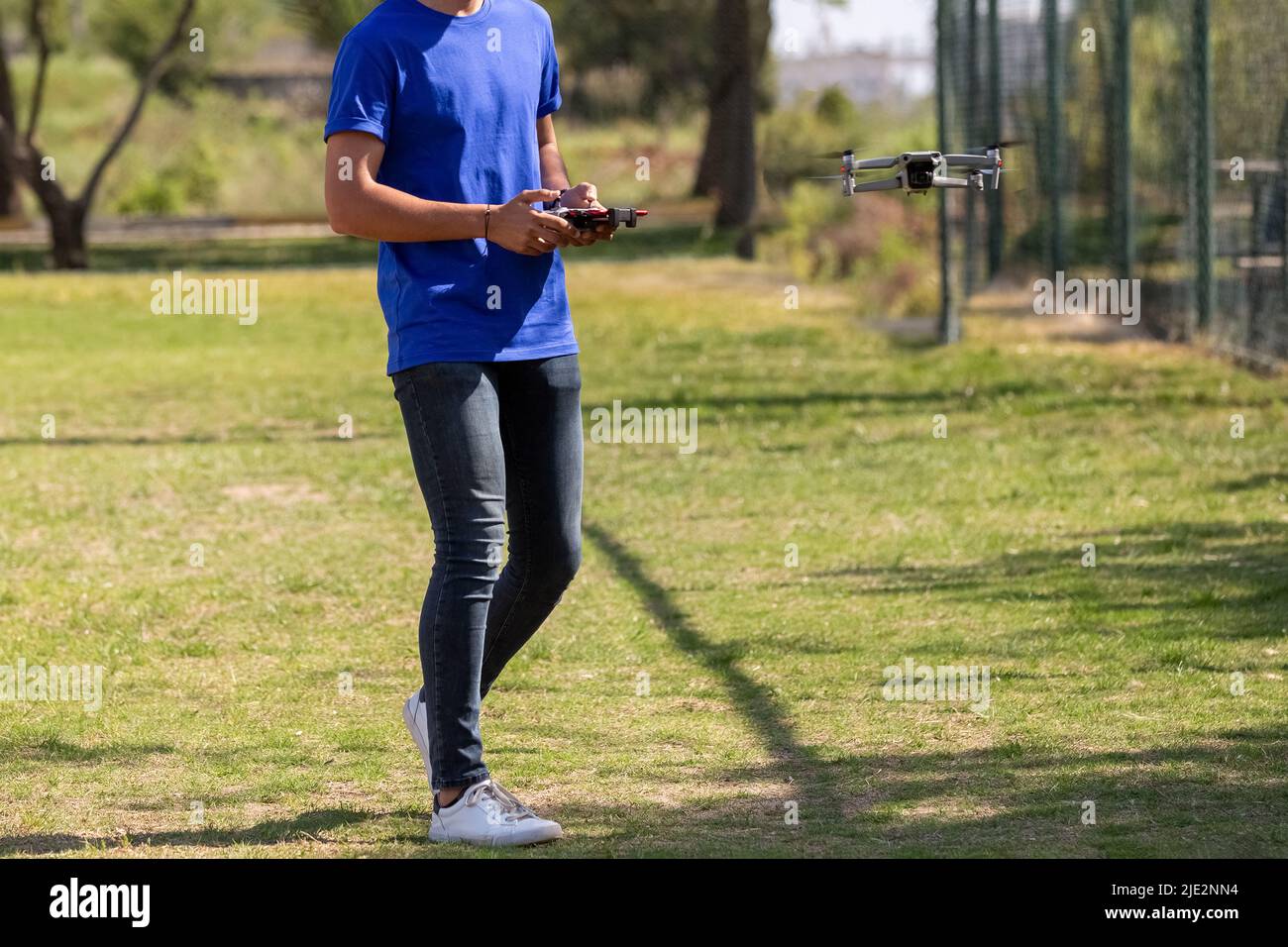 Silhouette young man flying drone hi-res stock photography and images ...