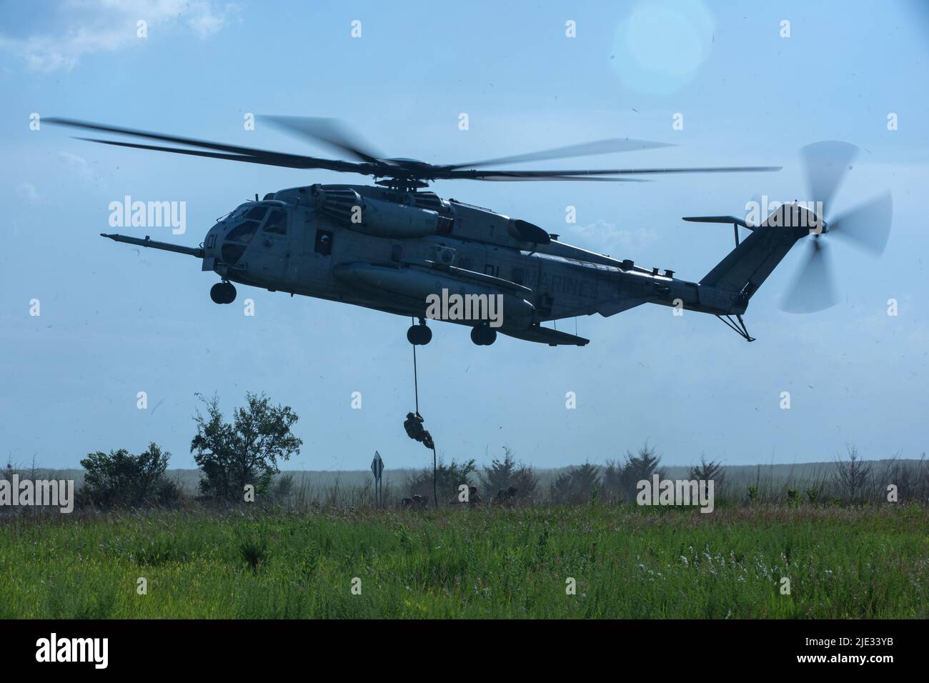 U.S. Marines and Soldiers fast-rope out of a CH-53E Super Stallion ...