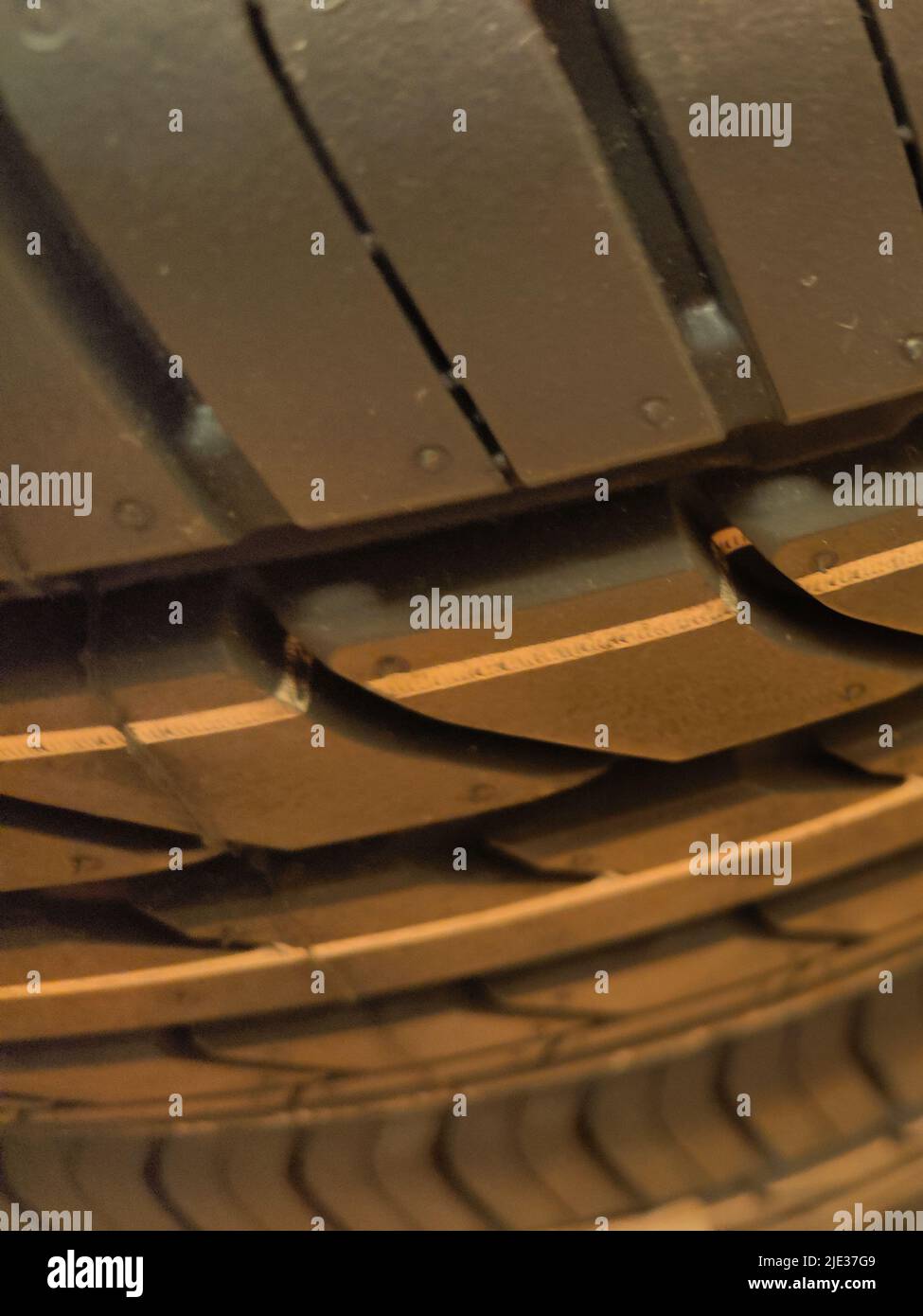 detail of a car wheel design indicating safety and grip on the road ...