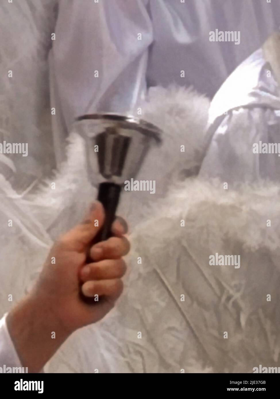 Angel ringing bell hi-res stock photography and images - Alamy