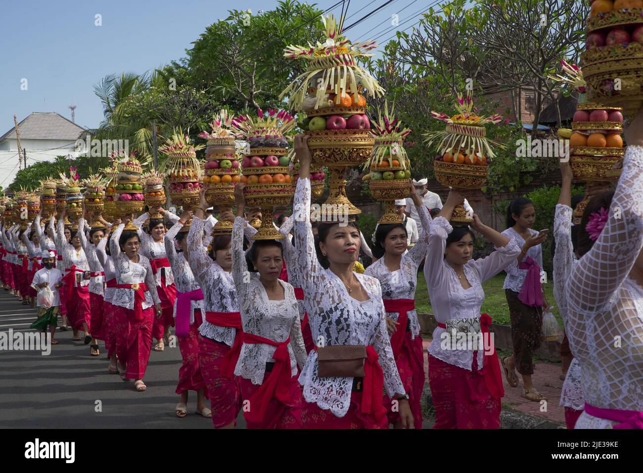 DENPASAR, JUNE 19 2022: the mepeed activity of a traditional village in ...