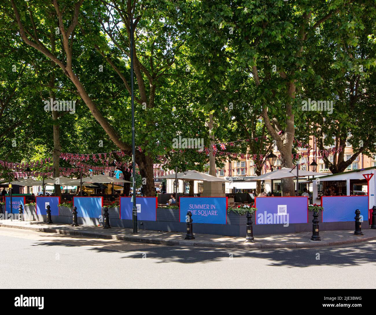 Sloane Square, Chelsea, London, summer 2022; banners advertising ...
