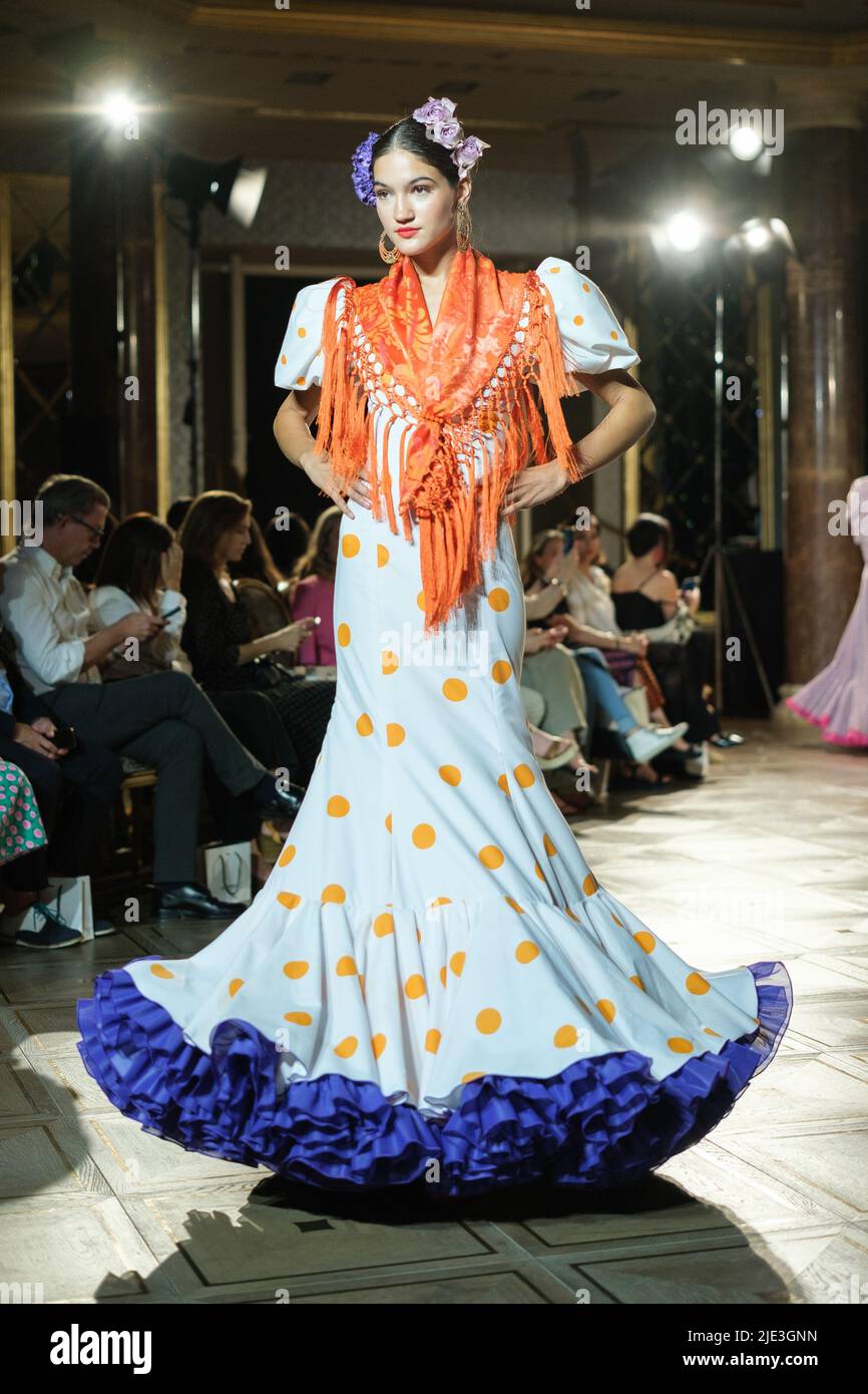 A model showcases a design of the brand Hermanos Serrano, the catwalk ...