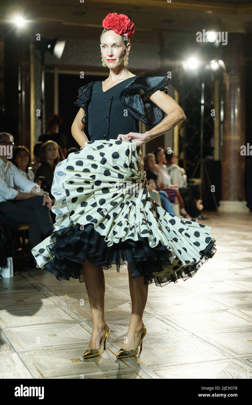 Madrid, Spain. 24th June, 2022. A model showcases a design of the brand ...