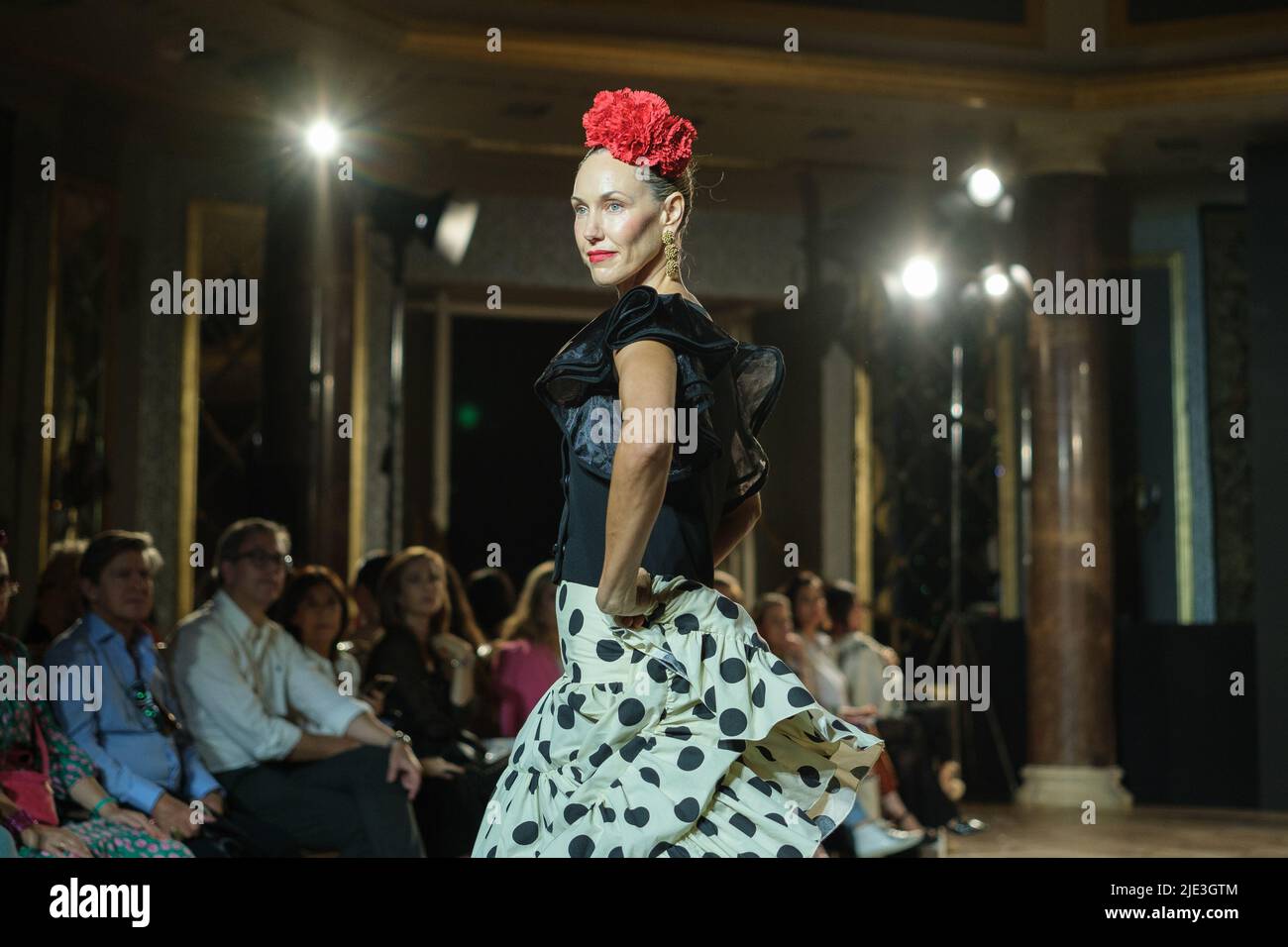 Madrid, Spain. 24th June, 2022. A model showcases a design of the brand ...