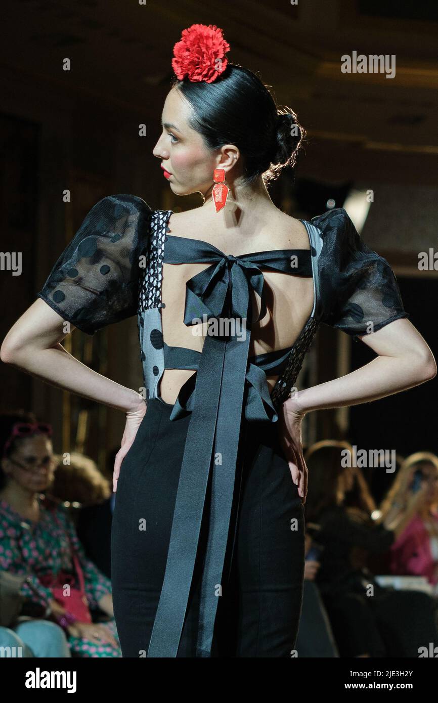 Madrid, Spain. 24th June, 2022. A model showcases a design of the brand ...