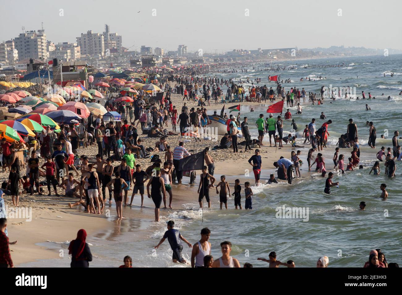 Gaza, Gaza. 24th June, 2022. Palestinians enjoy the beach in Gaza City ...
