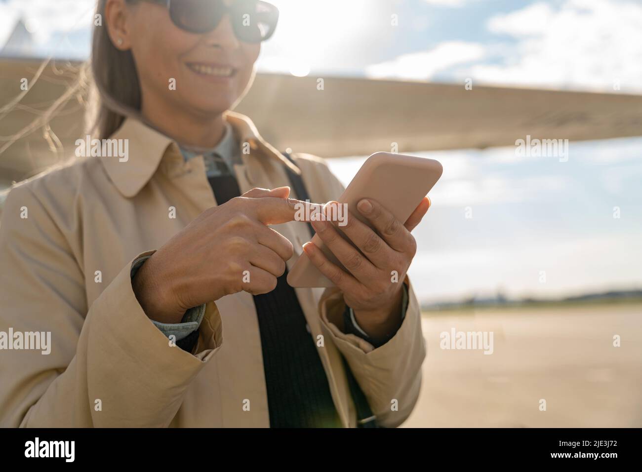 Person standing near airplane close hi-res stock photography and images ...