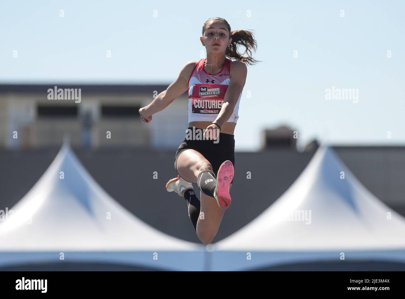 Rosalie Couturier, of Quebec City, competes in the women's long jump ...