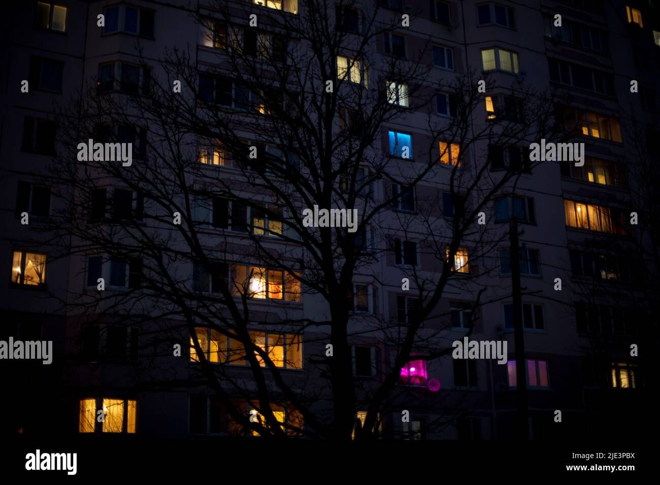 Light of windows of house. Apartment lights. Details of city at night ...