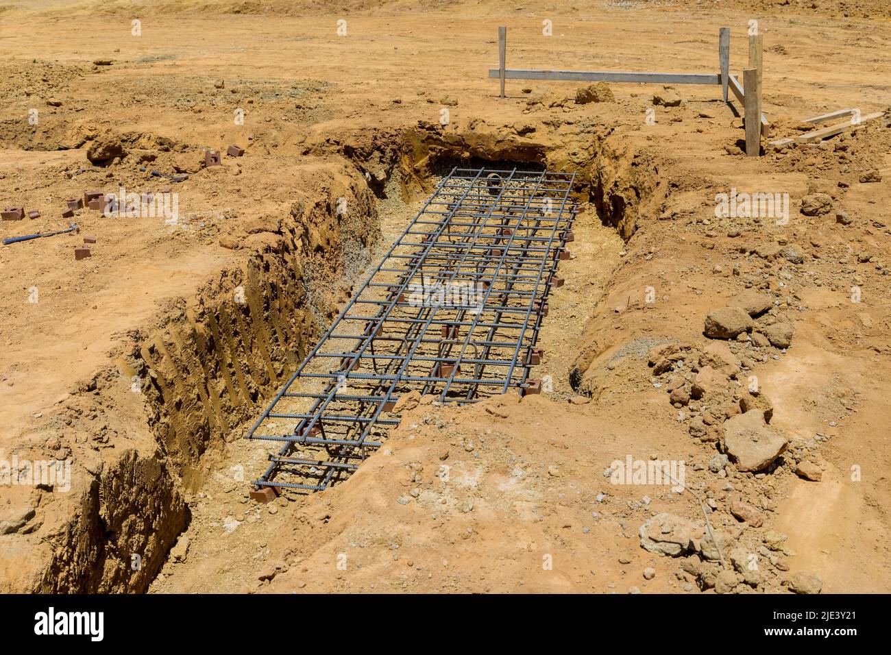 Work at a construction site with steel bar reinforcement for reinforced ...