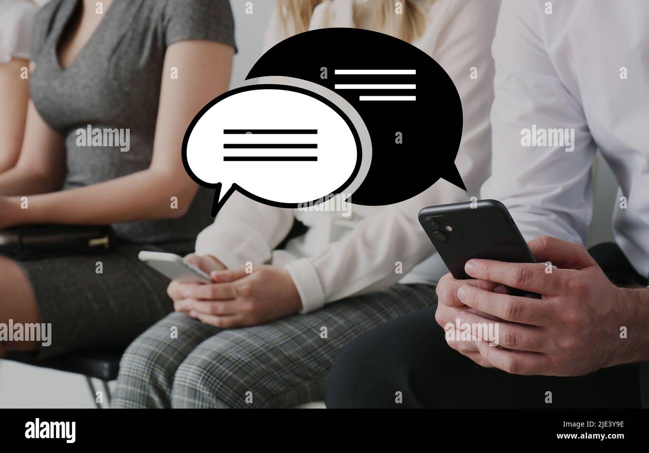 Business people with mobile phones chatting online in office Stock ...