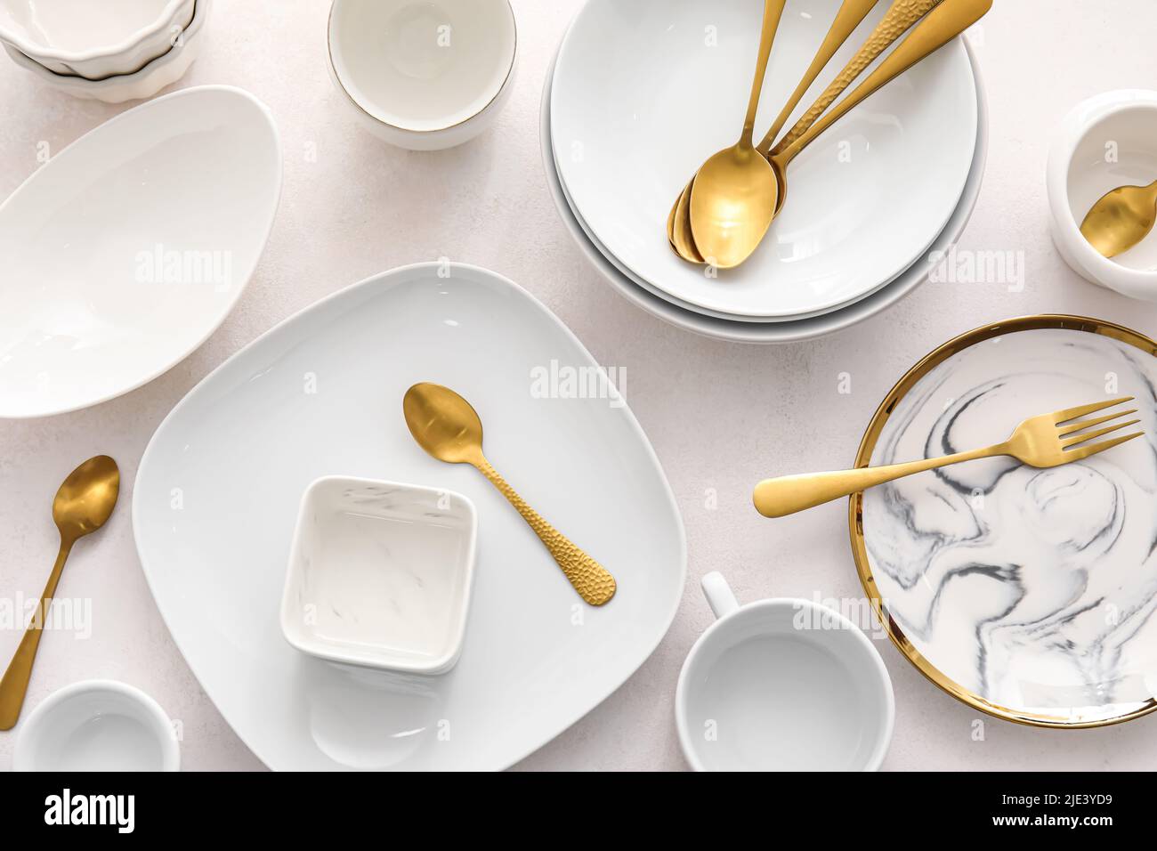 Beautiful dinnerware on white background Stock Photo - Alamy