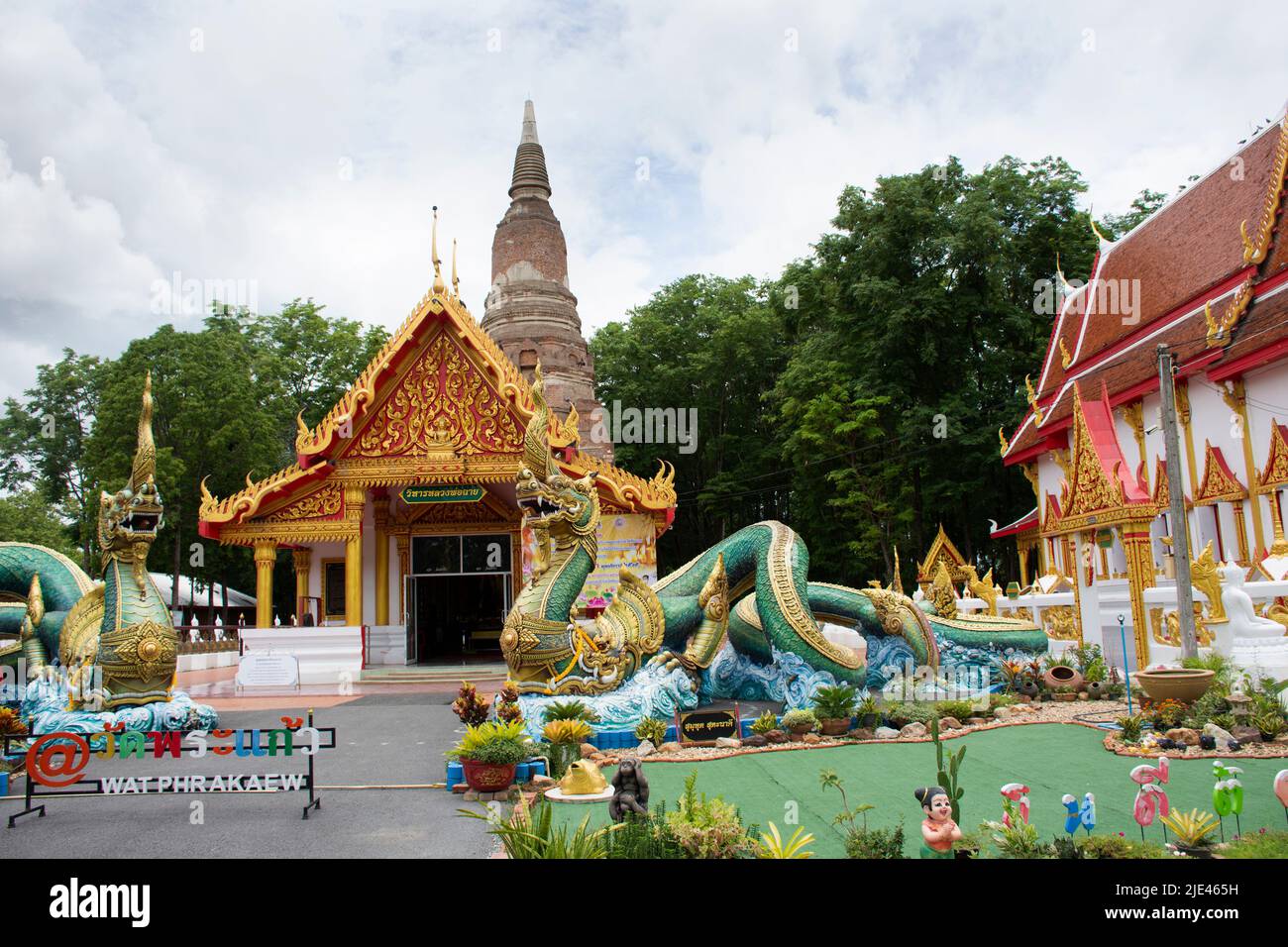 Ancient ubosot church and ruin stupa or chedi and antique naga statue for thai people travel ...