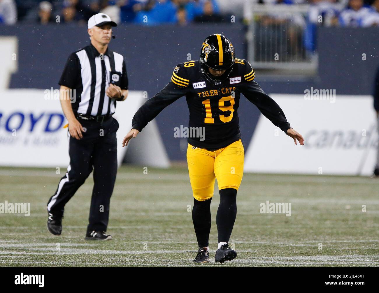 Hamilton Tiger-Cats kicker Michael Domagala (19) reacts after he misses ...