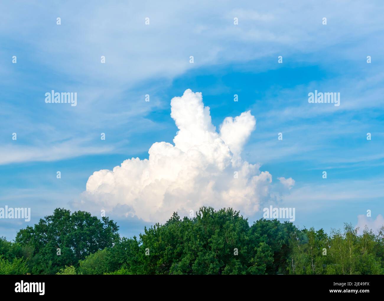 A large beautiful white cloud in the shape of a sign of victory V Stock ...