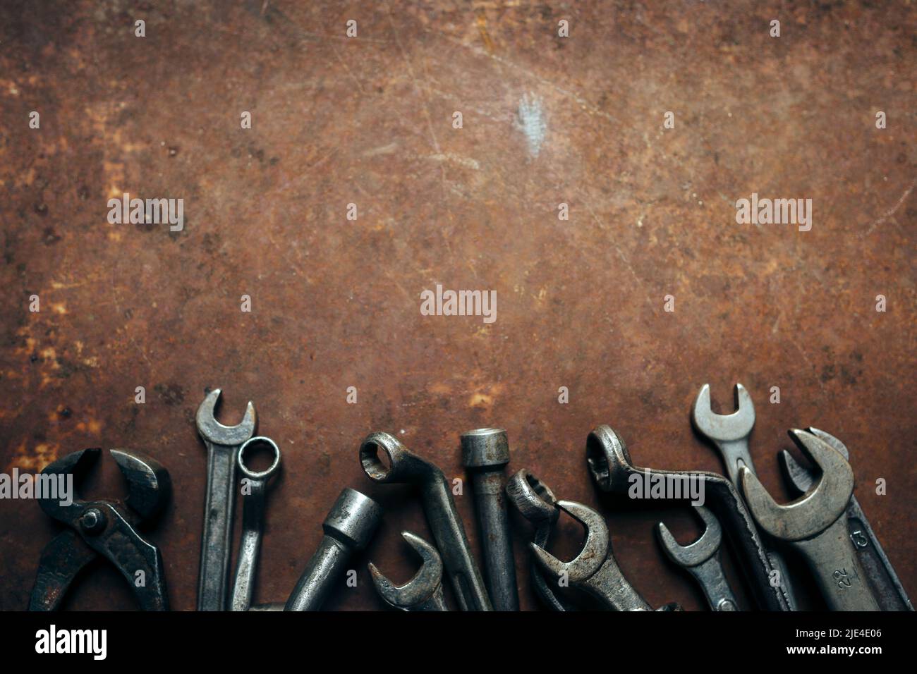 Tool kit on a rusty old metal background Stock Photo - Alamy