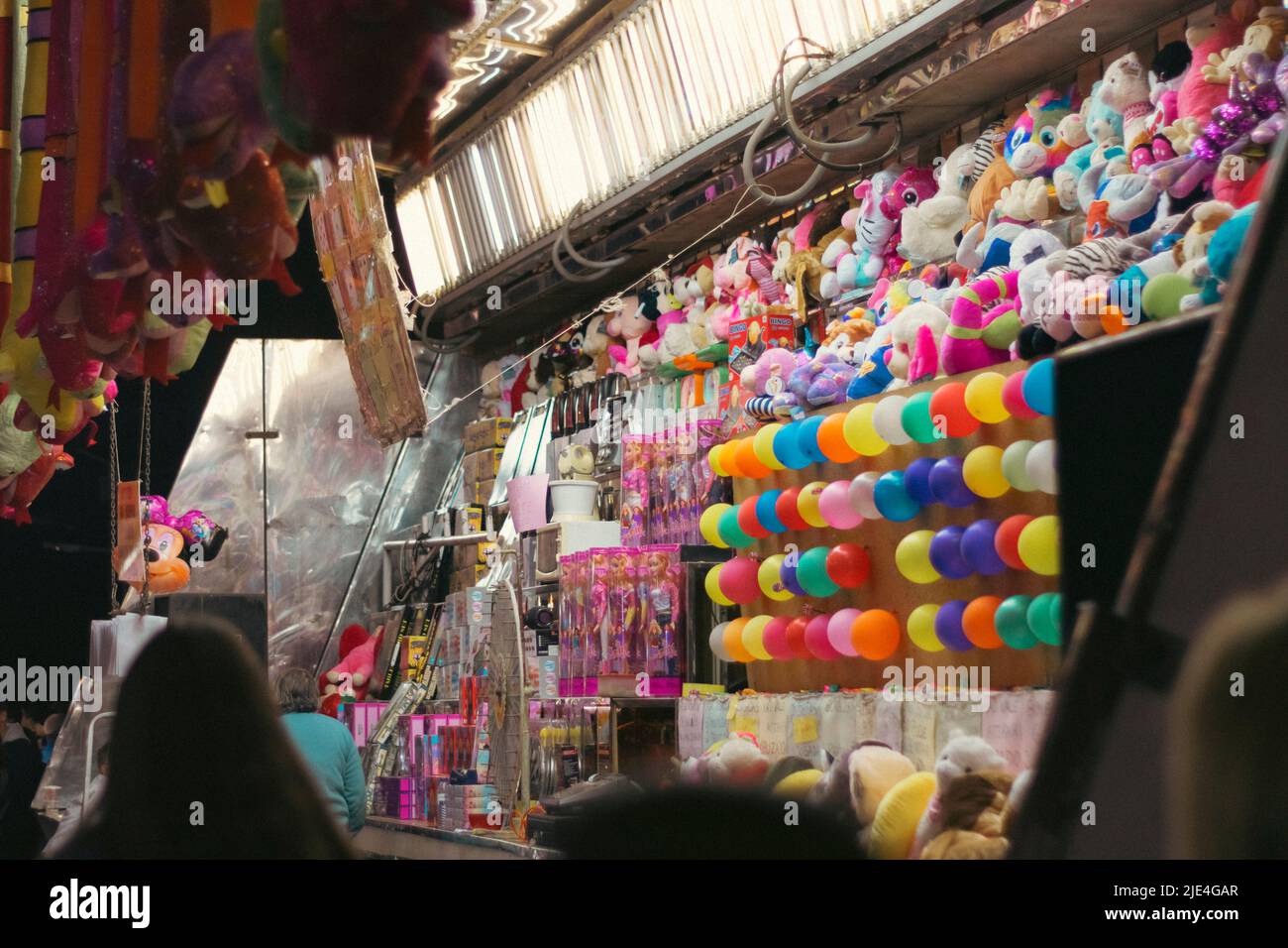 Shooting balloons to win prizes Stock Photo - Alamy