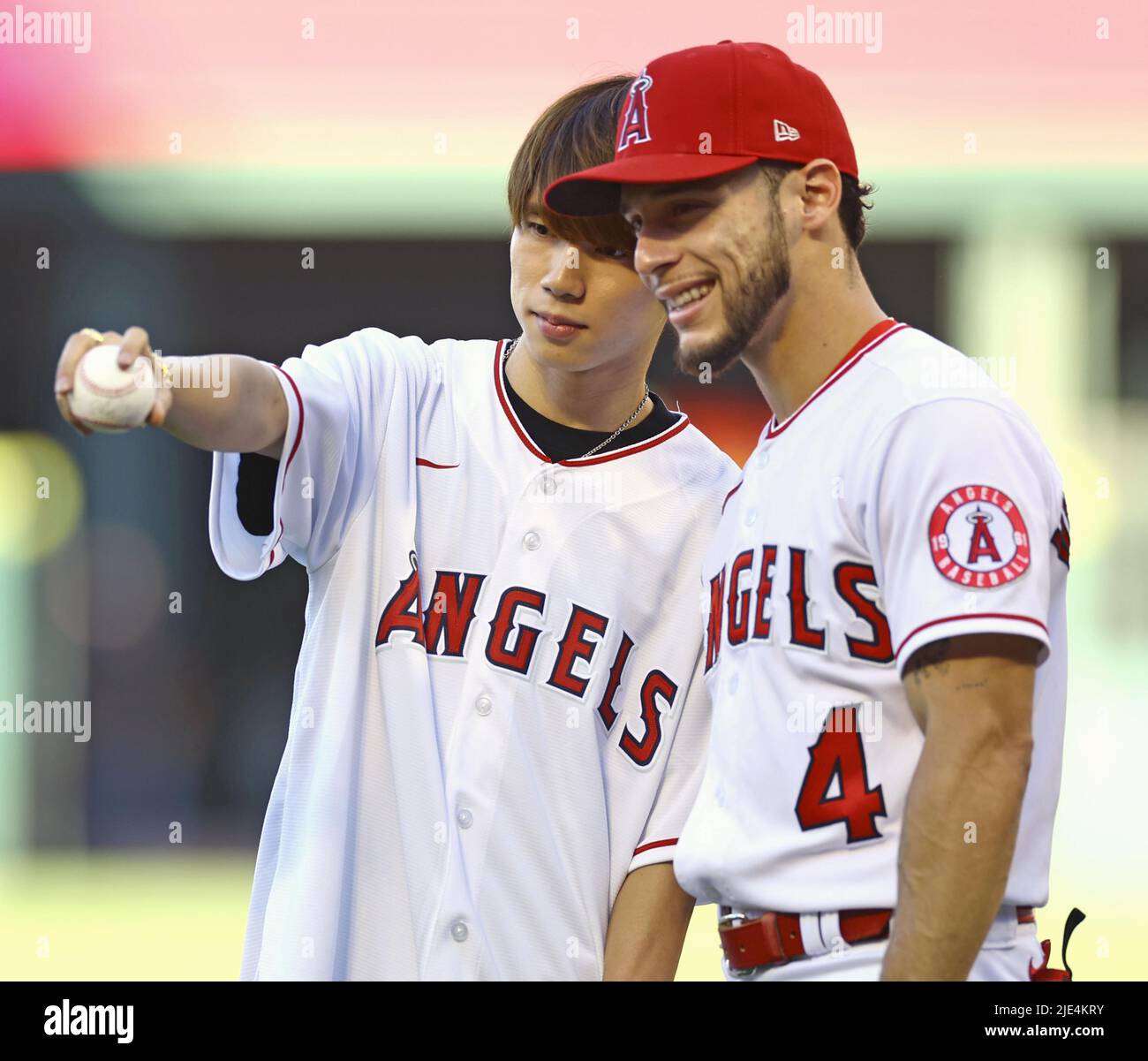 Olympic skateboarding gold medalist Yuto Horigome (L) poses for a photo ...