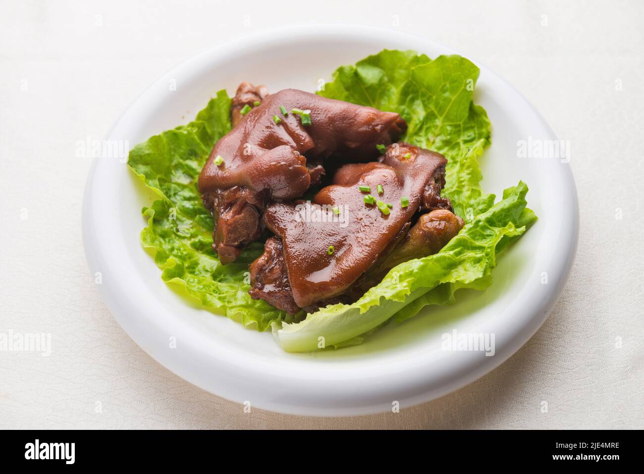 Soft waxy bullet tooth stewed pork Stock Photo - Alamy