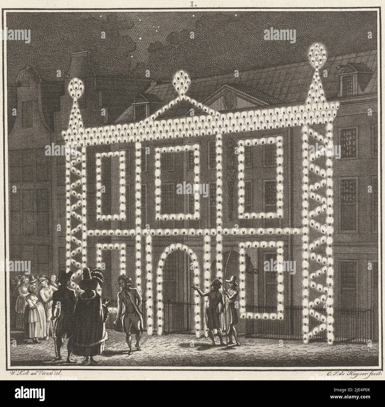 The illuminated facade of the general post office in Amsterdam on the ...