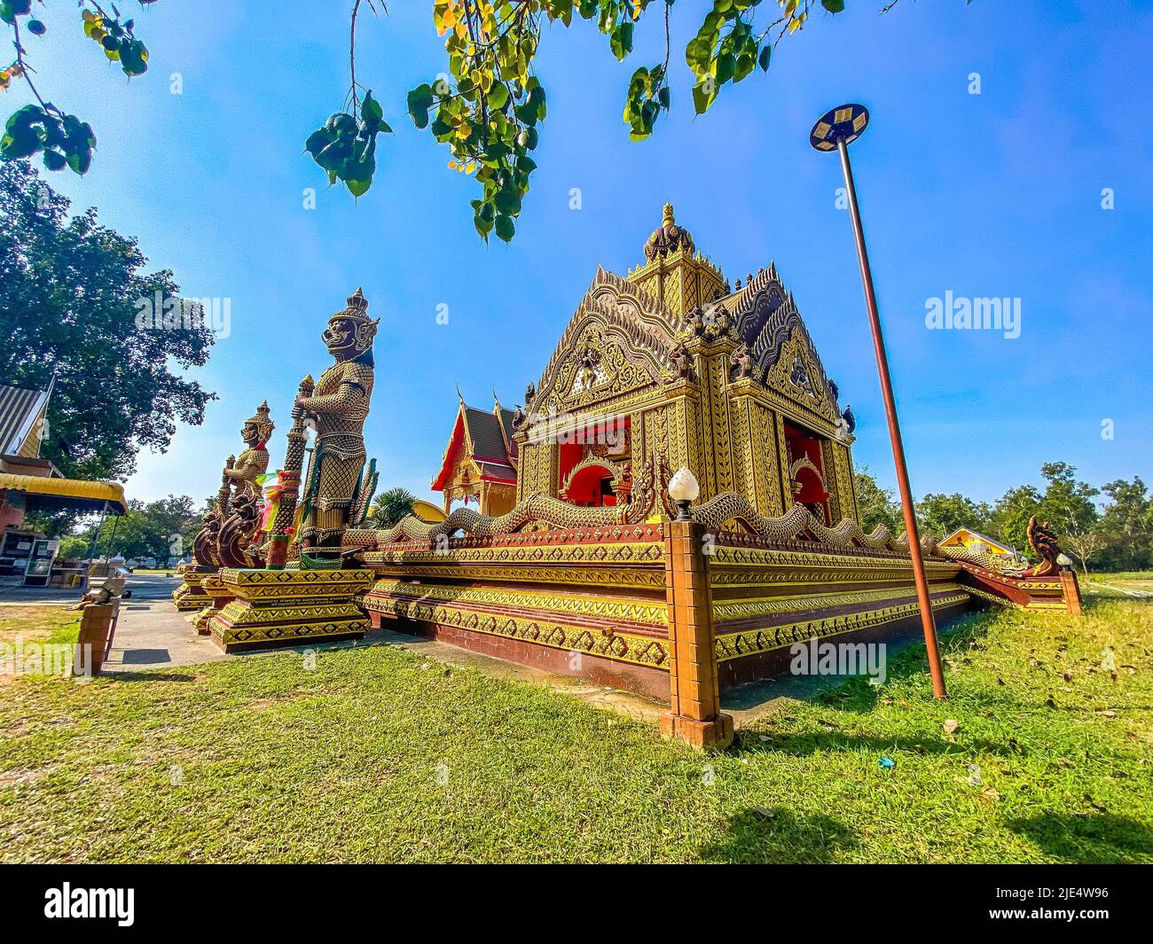 Wat Khao Kalok gold temple in Prachuap Khiri Khan, Thailand Stock Photo ...