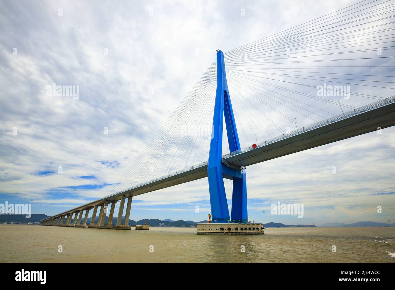 Jintang Bridge and sea traffic in Zhoushan, Zhejiang, with sunny blue ...