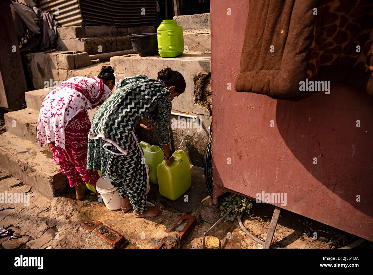 Filling water pot hi-res stock photography and images - Alamy