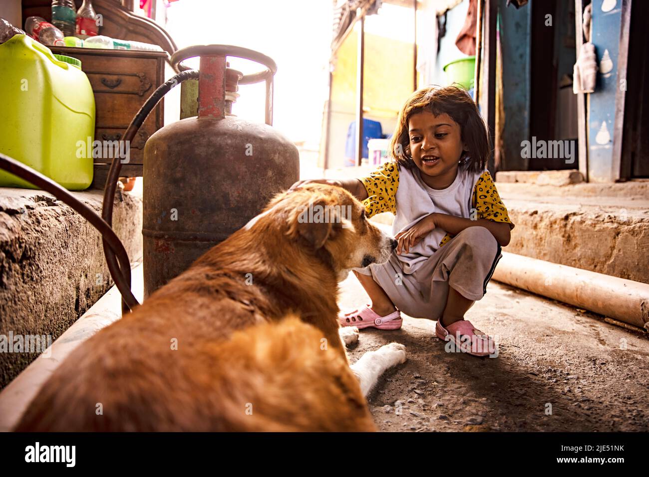 Kids playing dog home hi-res stock photography and images - Alamy