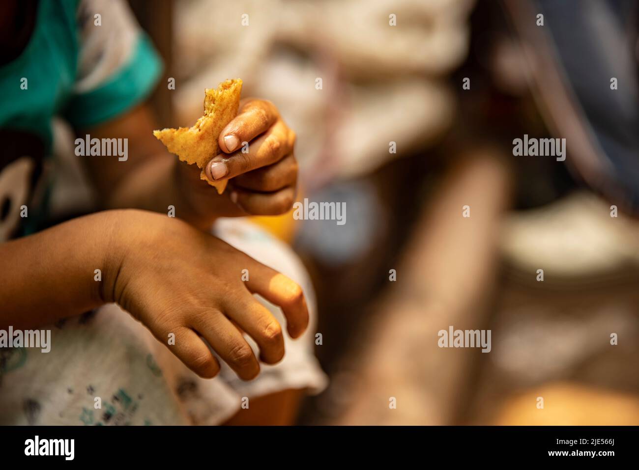 Indian boys eating hi-res stock photography and images - Alamy