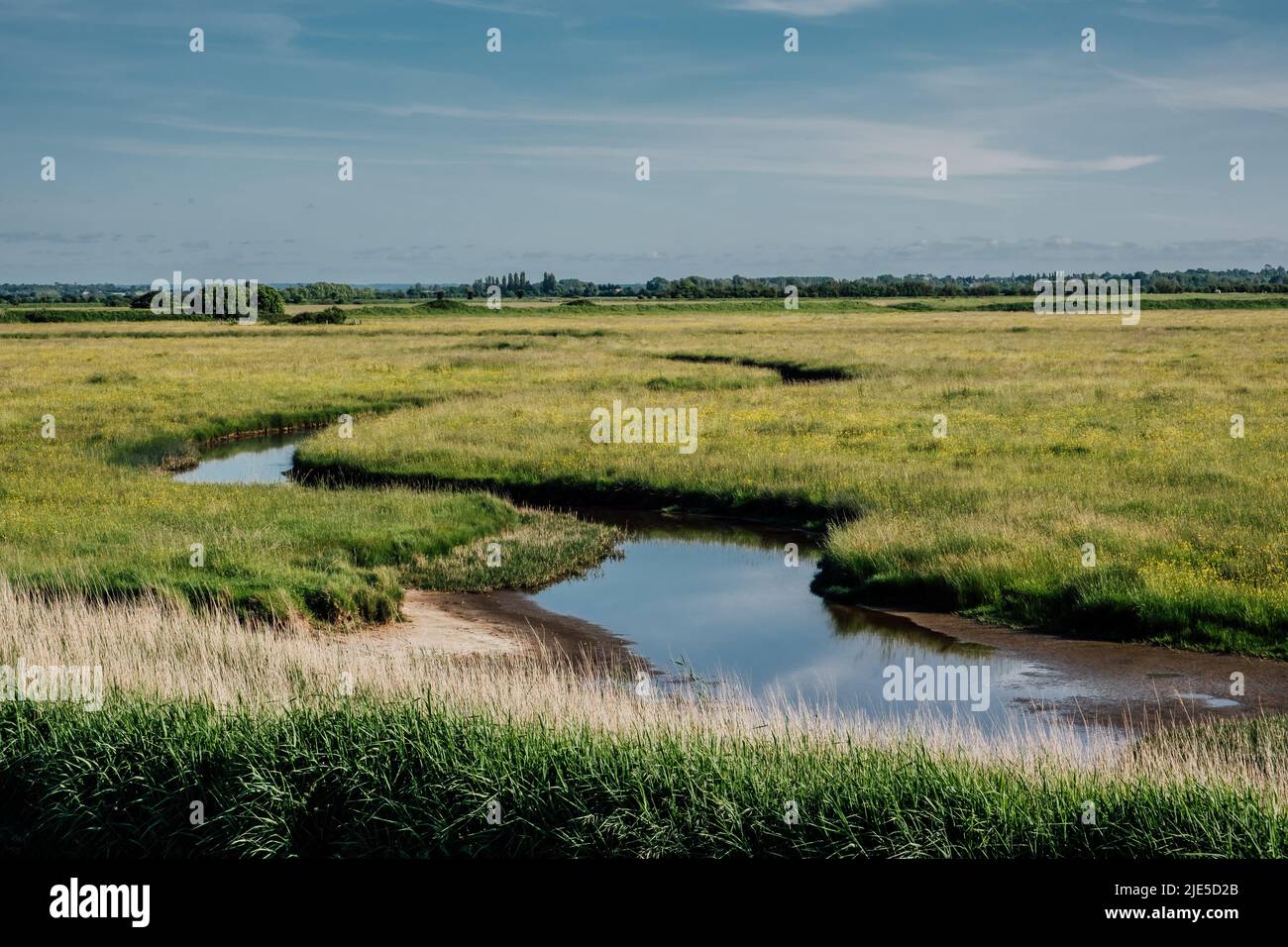 Beautiful landscape of marsh in Normandy in France with snaking river ...