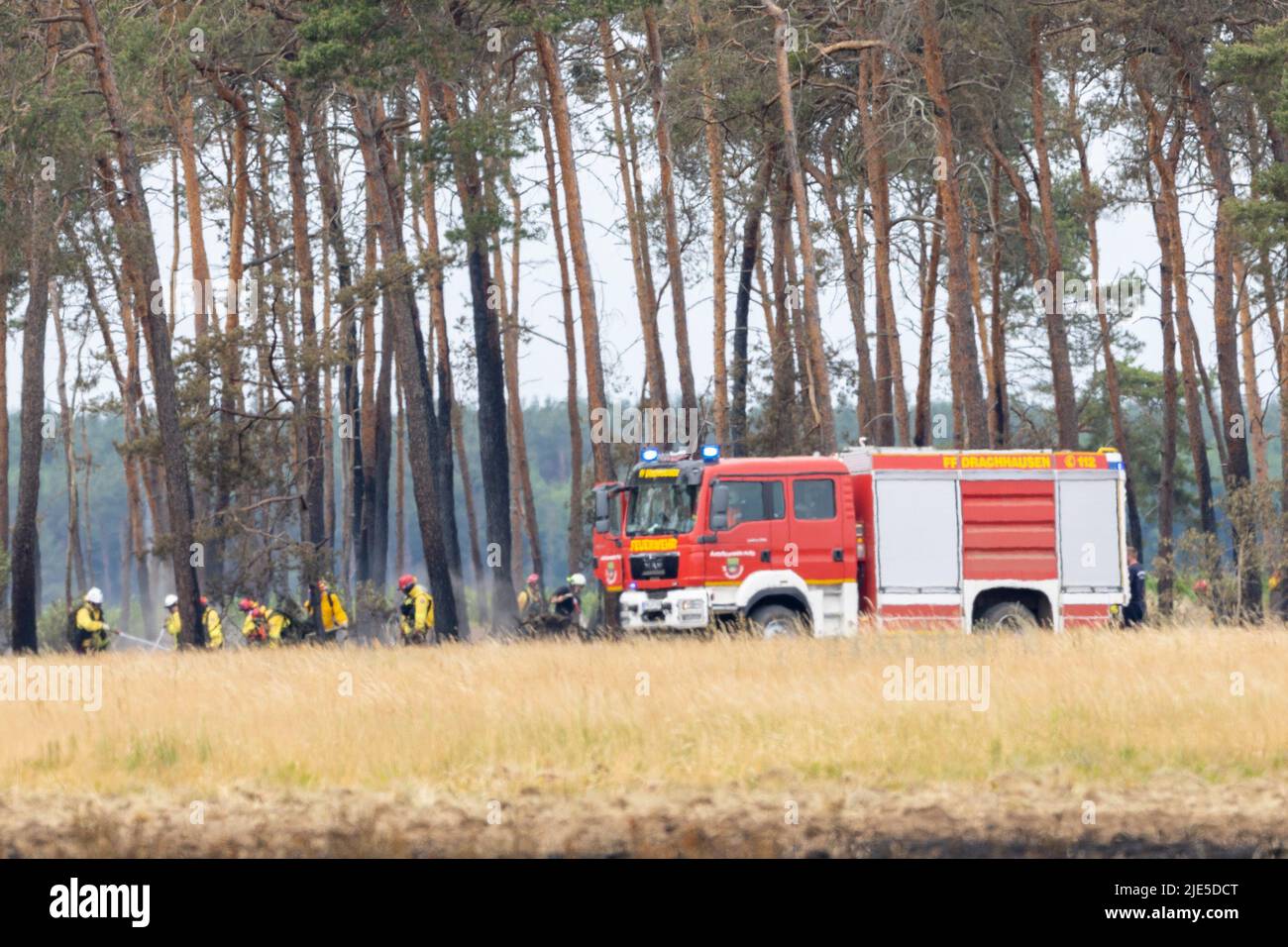 Kosilenzien, Germany. 25th June, 2022. A fire truck and numerous ...