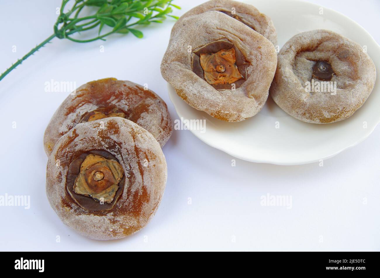 Manual dried persimmon hi-res stock photography and images - Alamy