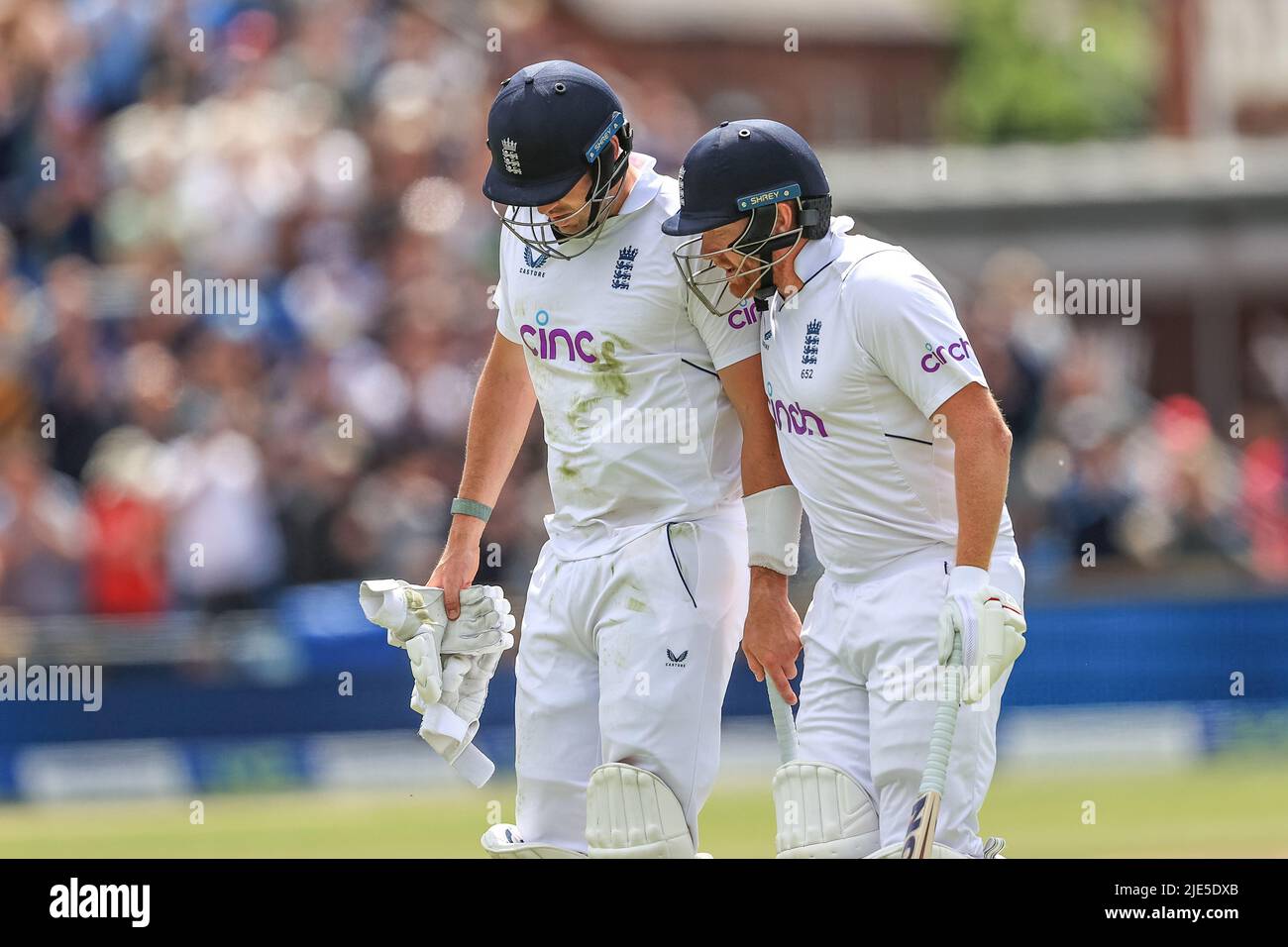 Jonny Bairstow of England gives Jamie Overton of England a pat on the ...