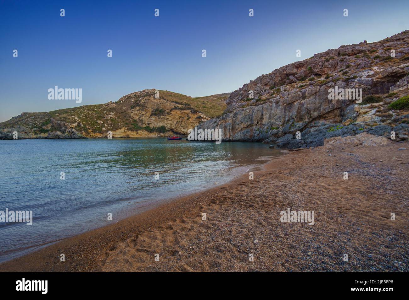 View of the famous rocky beach Melidoni in Kythira island at sunset ...