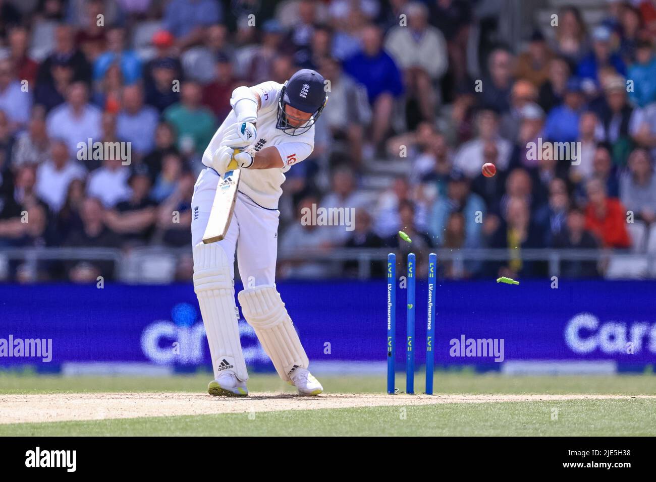 Stuart Broad of England is bowled out by Tim Southee of New Zealand ...