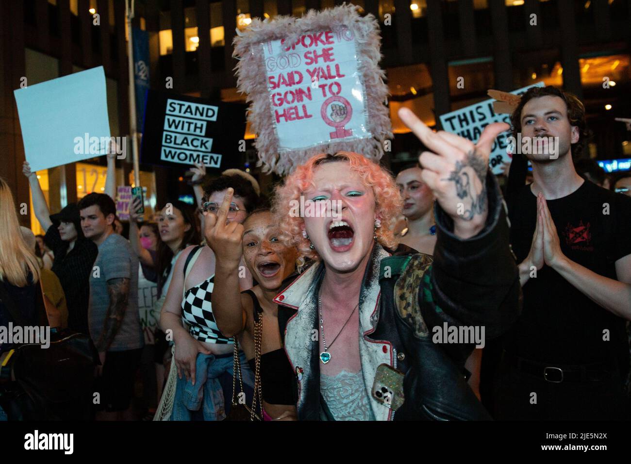 (Editors note image depicts profanity)Protesters give the middle finger ...