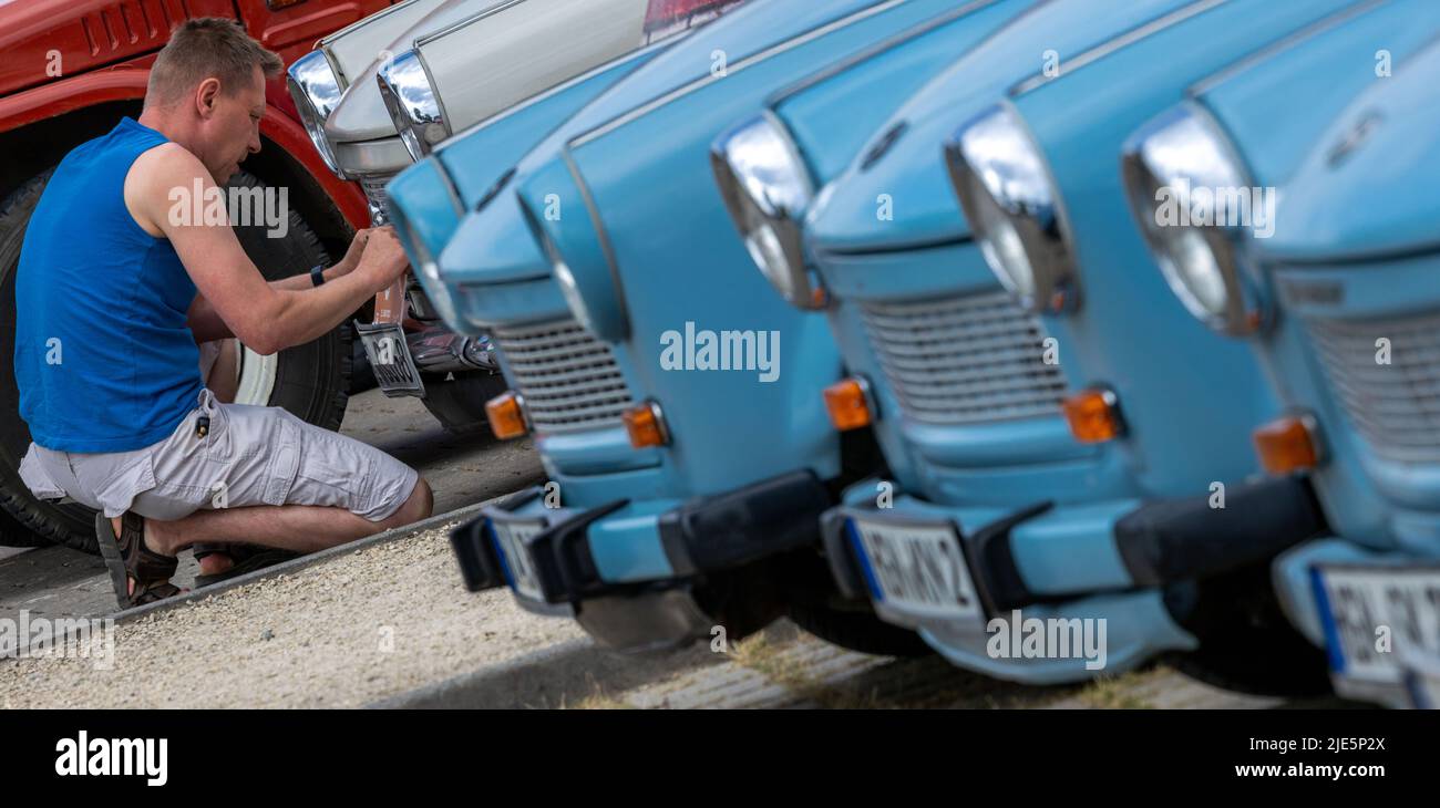 Wismar, Germany. 25th June, 2022. A Trabant owner prepares his vehicle ...